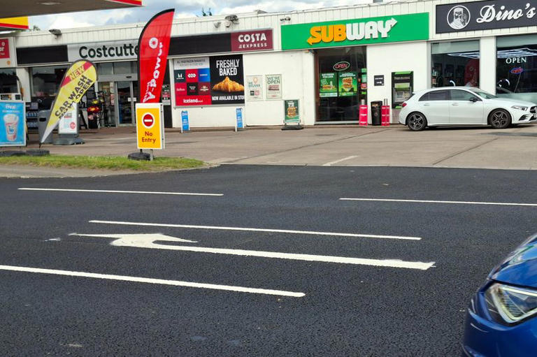 Botched road marking directs drivers wrong way into petrol station