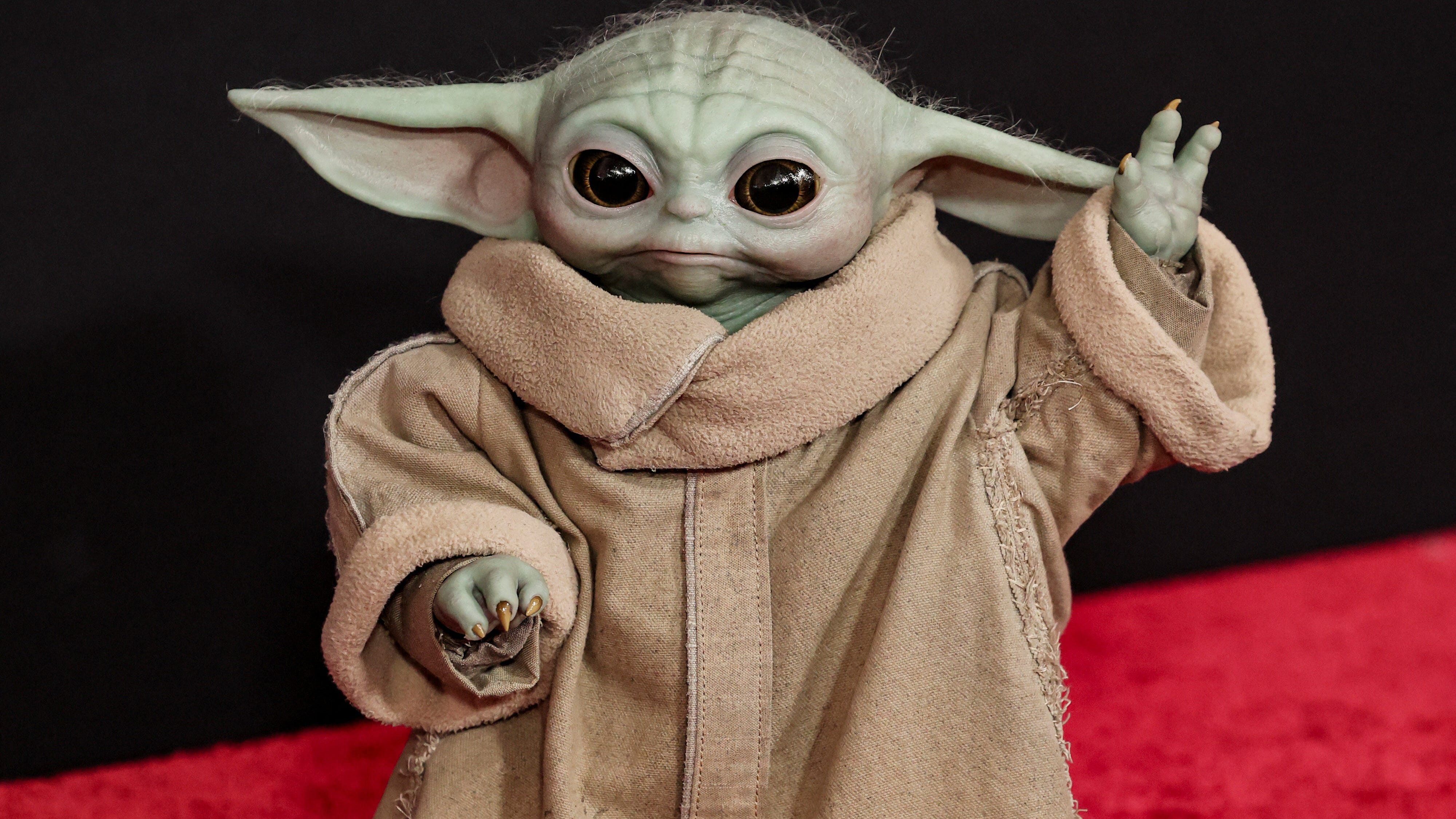 Grogu gives USA TODAY a smile on 'The Mandalorian & Grogu' red carpet