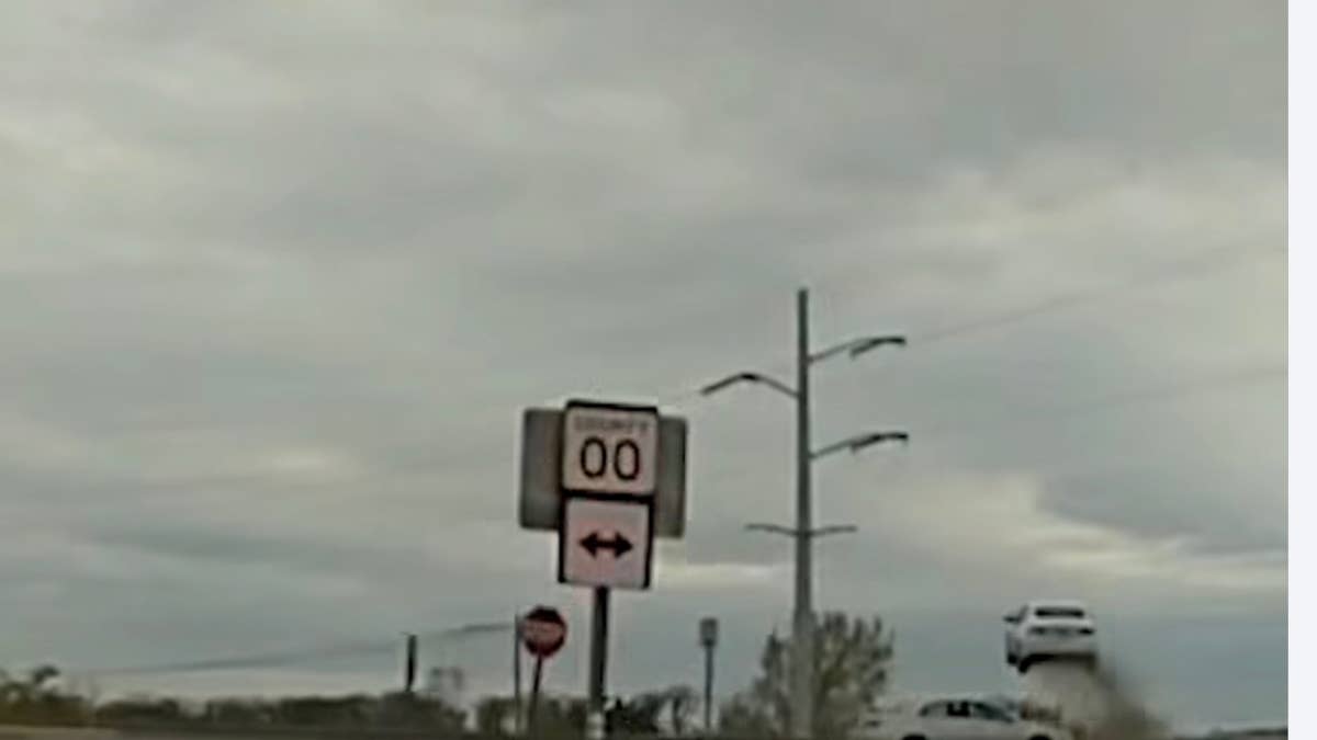 Watch: Remarkable moment driver goes airborne, leaps over car during chase