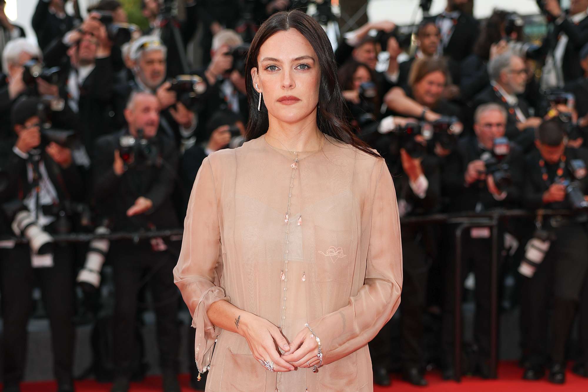 Riley Keough flirts with breaking Cannes Film Festival dress code in ...