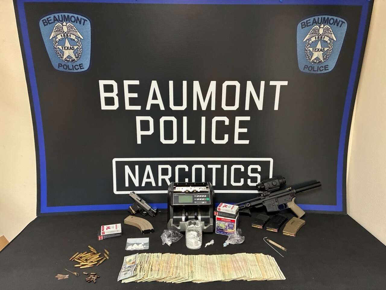 Beaumont drug raids uncover guns, cash and lead to two arrests