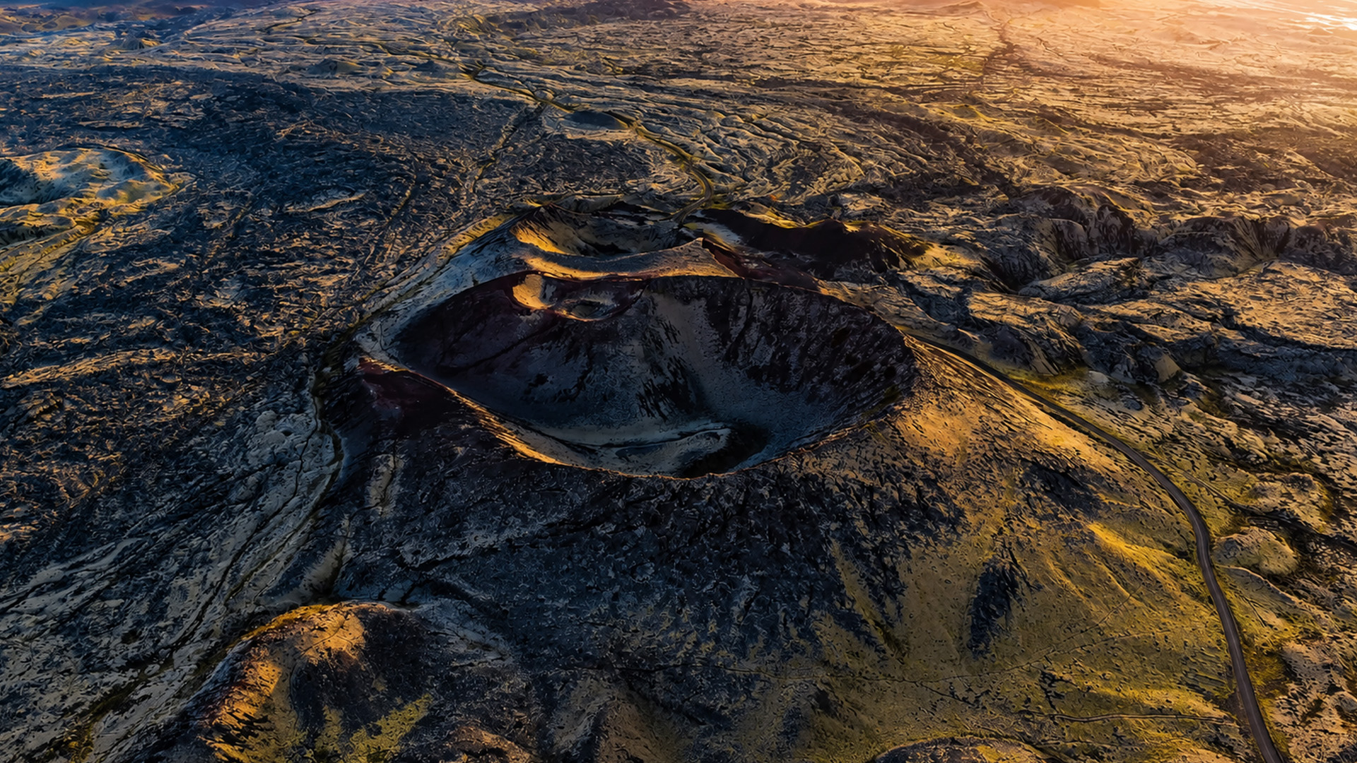 Roads crossing a burned volcanic wilderness