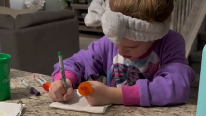 Father and daughter illustrate their love on lunch napkins while apart