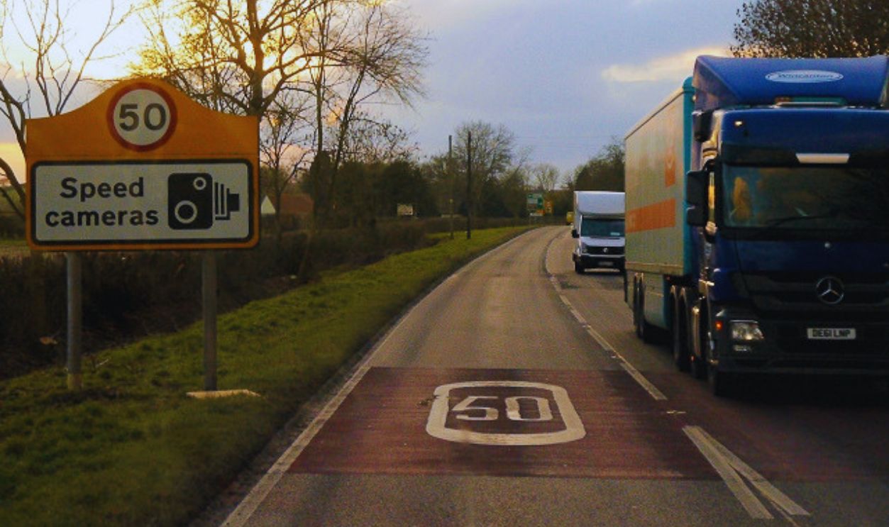 I got a speeding ticket from a traffic camera, but the sign was ...