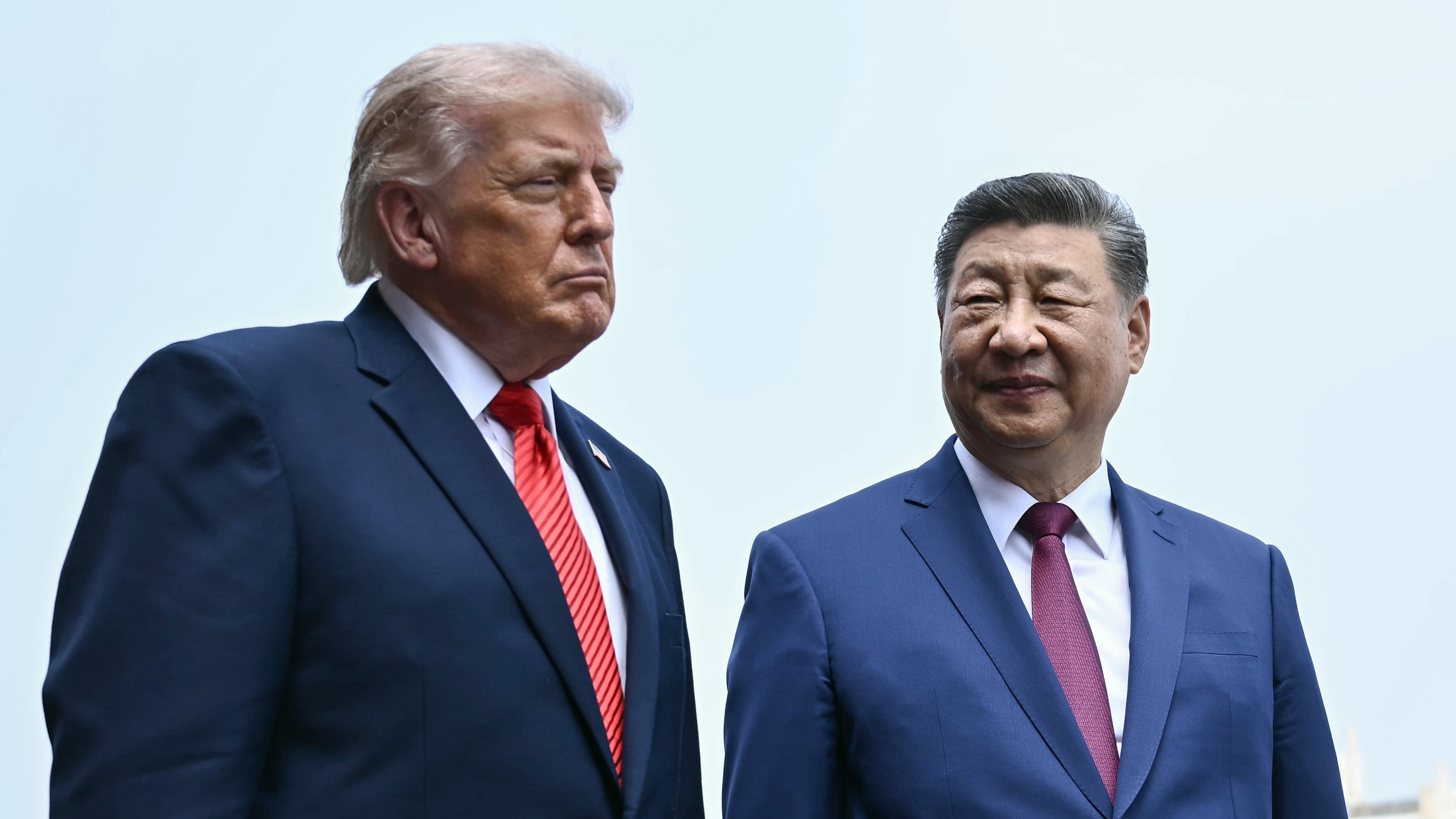 Xi takes veiled swipe at Trump as he greets his frenemy