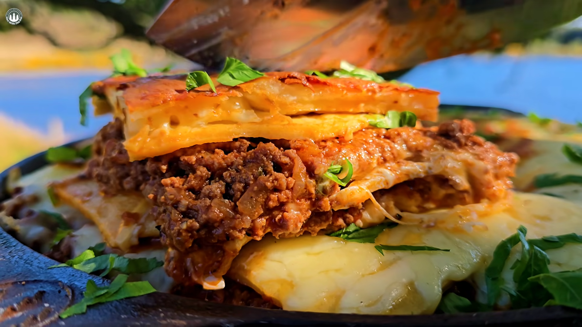 Watch how this lasagna turns perfect over open fire