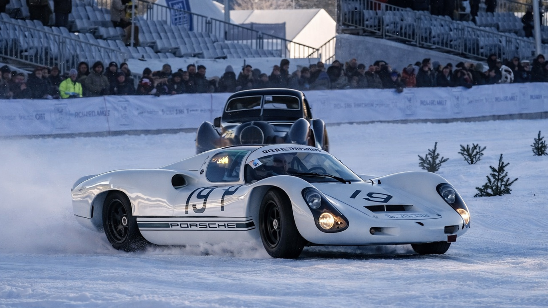 Porsche 910 is racing on a snow track