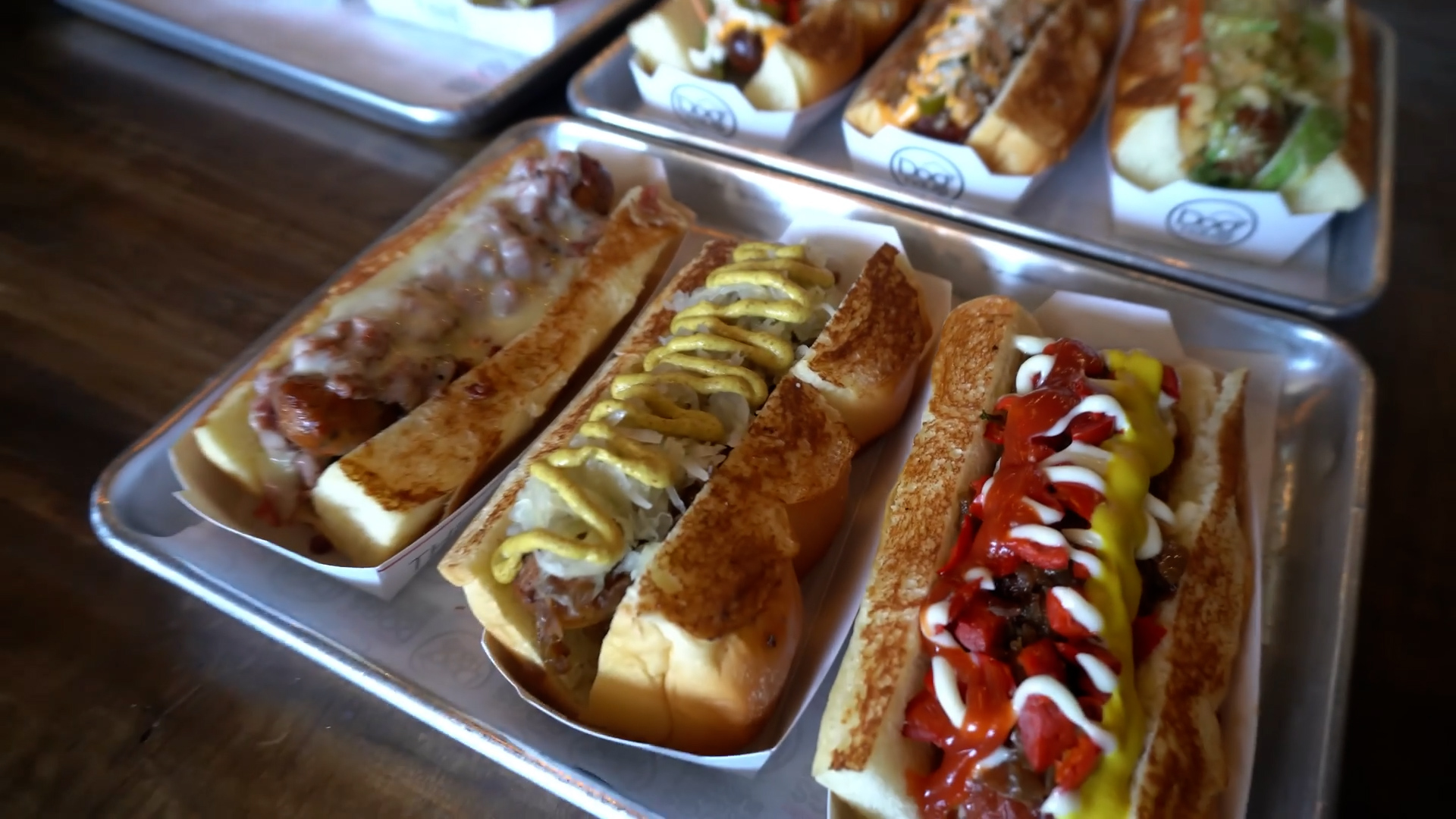 Man attempts giant hot dog challenge loaded with burgers, sausages and ...