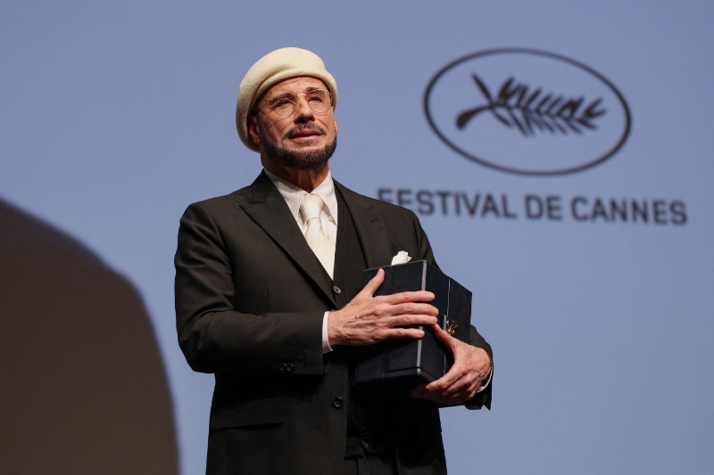 John Travolta surprised with Cannes award ahead of directorial debut
