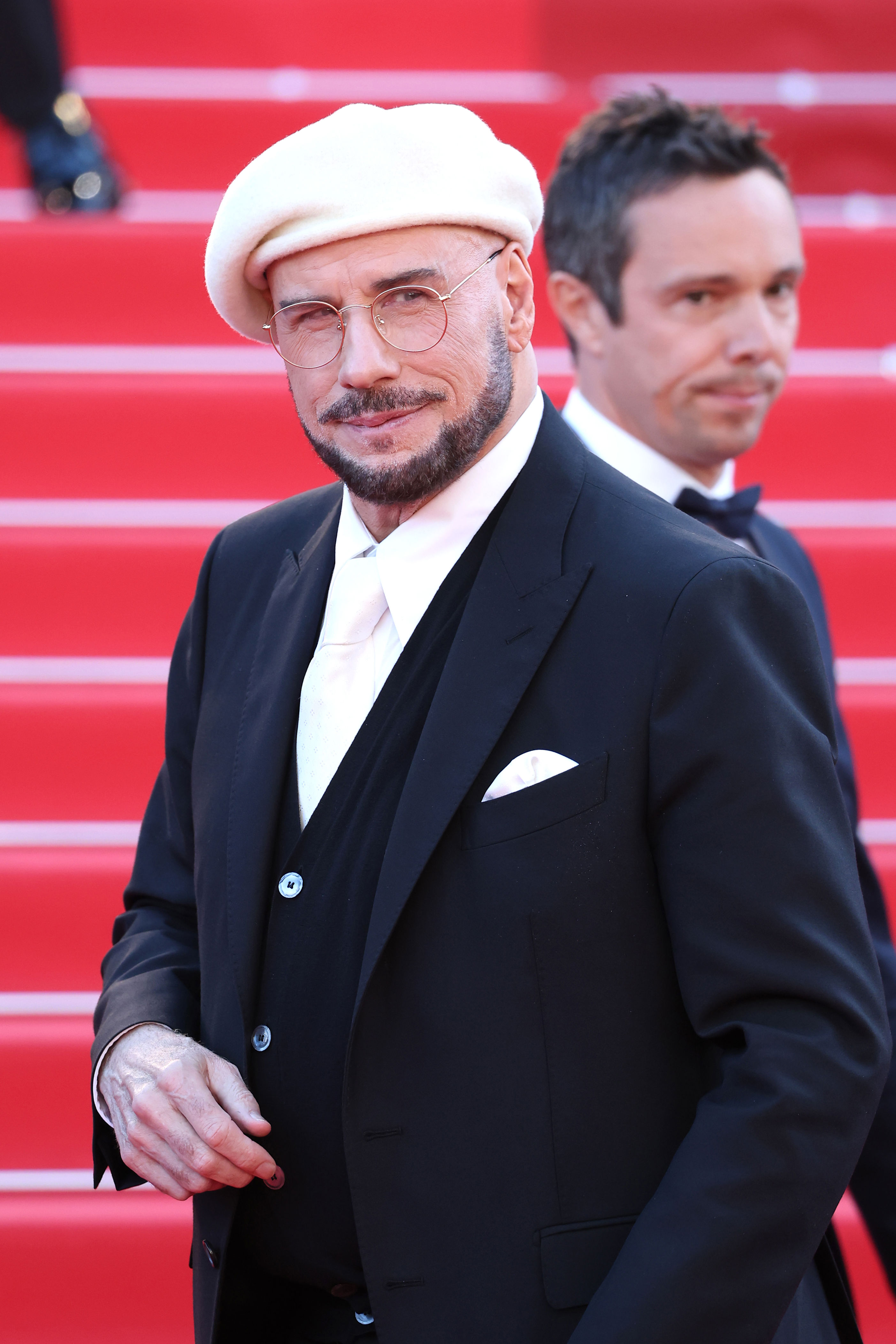 John Travolta looks unrecognizable at Cannes Film Festival with wild ...