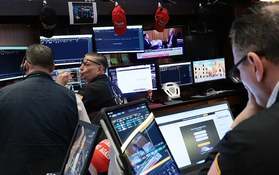 Global markets tumble as inflation fears rattle bonds and stocks