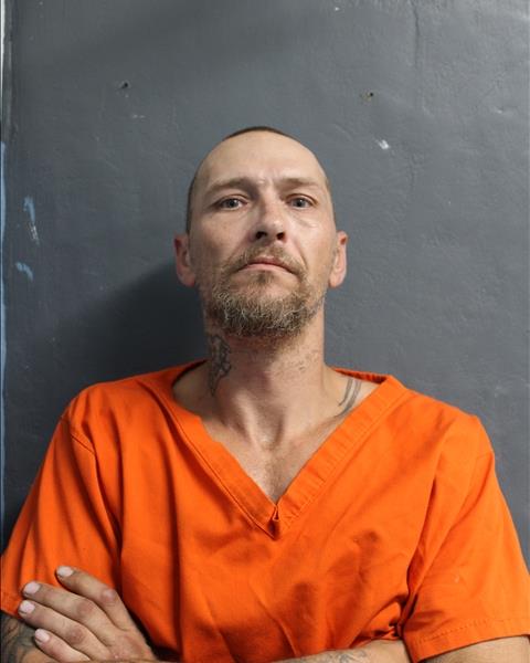 Police: Suspect with extensive record fired shots at Grove police