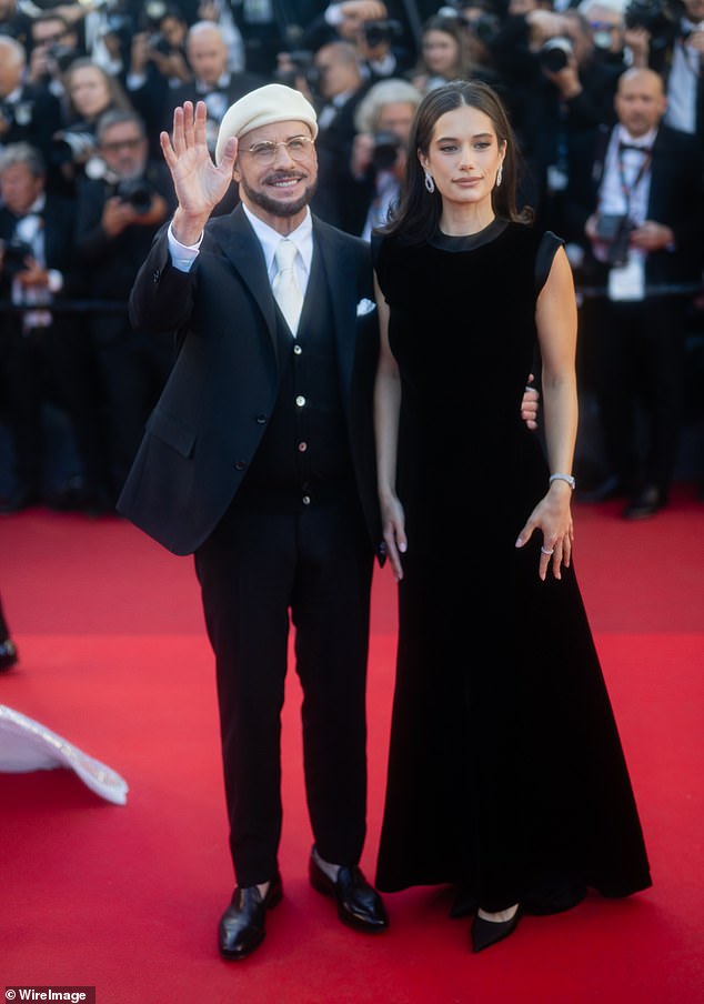 John Travolta, 72, roasted over Cannes red carpet look as he poses with ...