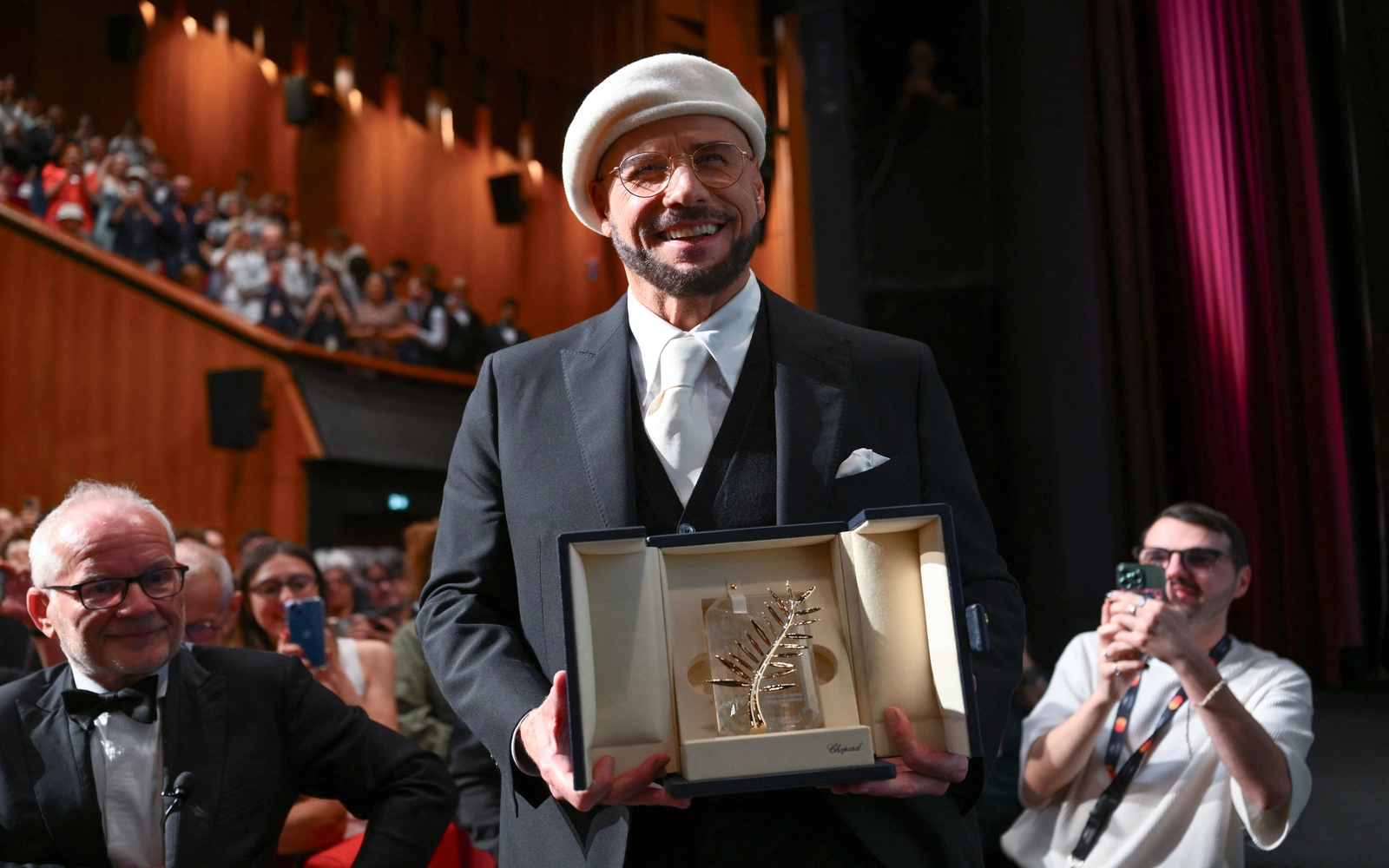 Travolta gets surprise Cannes prize for career beyond the Oscar