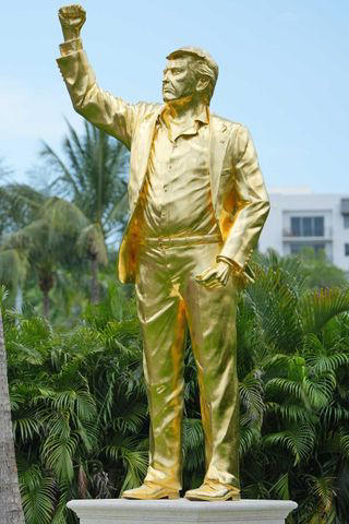 Trump proclaims people 'love' 22-foot gold statue dedicated to him at ...
