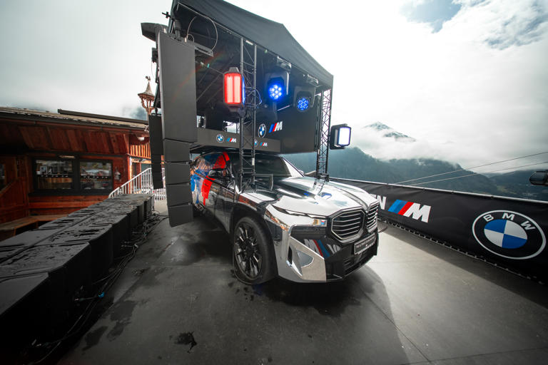 BMW threw a DJ stand on a blinged out XM