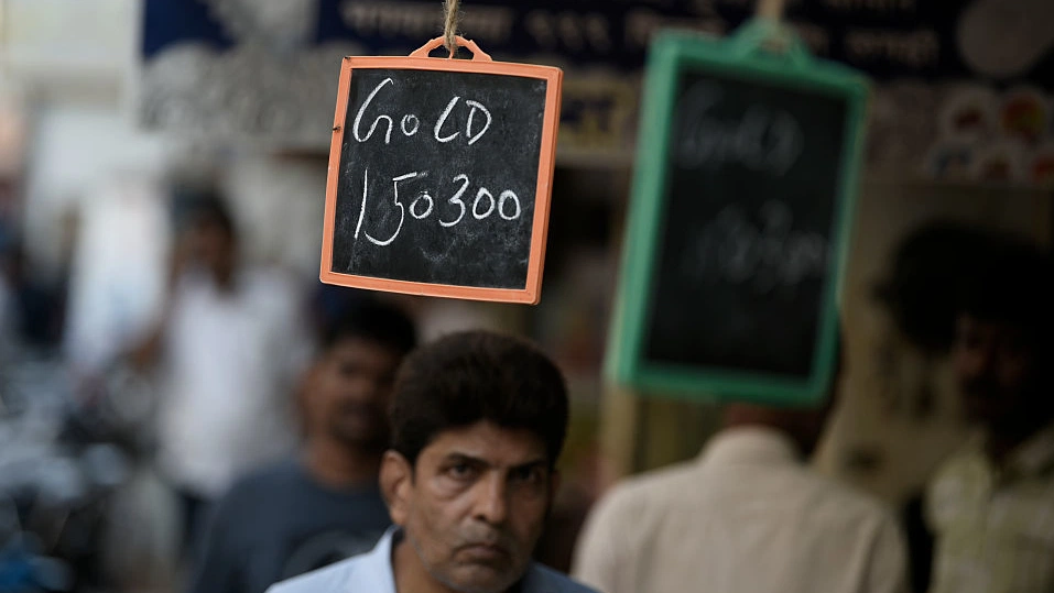 Gold prices ease after record discount and duty hike