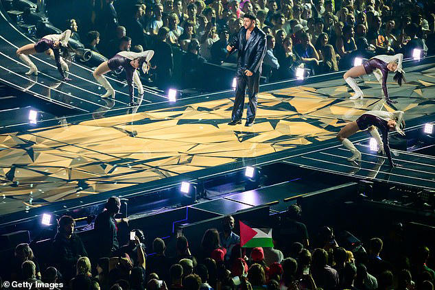 Ukraine, Israel and Palestine flags are flown during Eurovision dress ...
