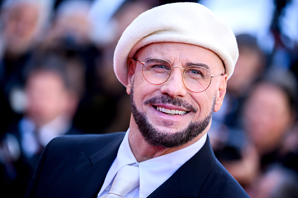 Cannes: John Travolta gets surprise Palme d'Or; ovation-meter update