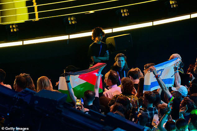 Ukraine, Israel and Palestine flags are flown during Eurovision dress ...