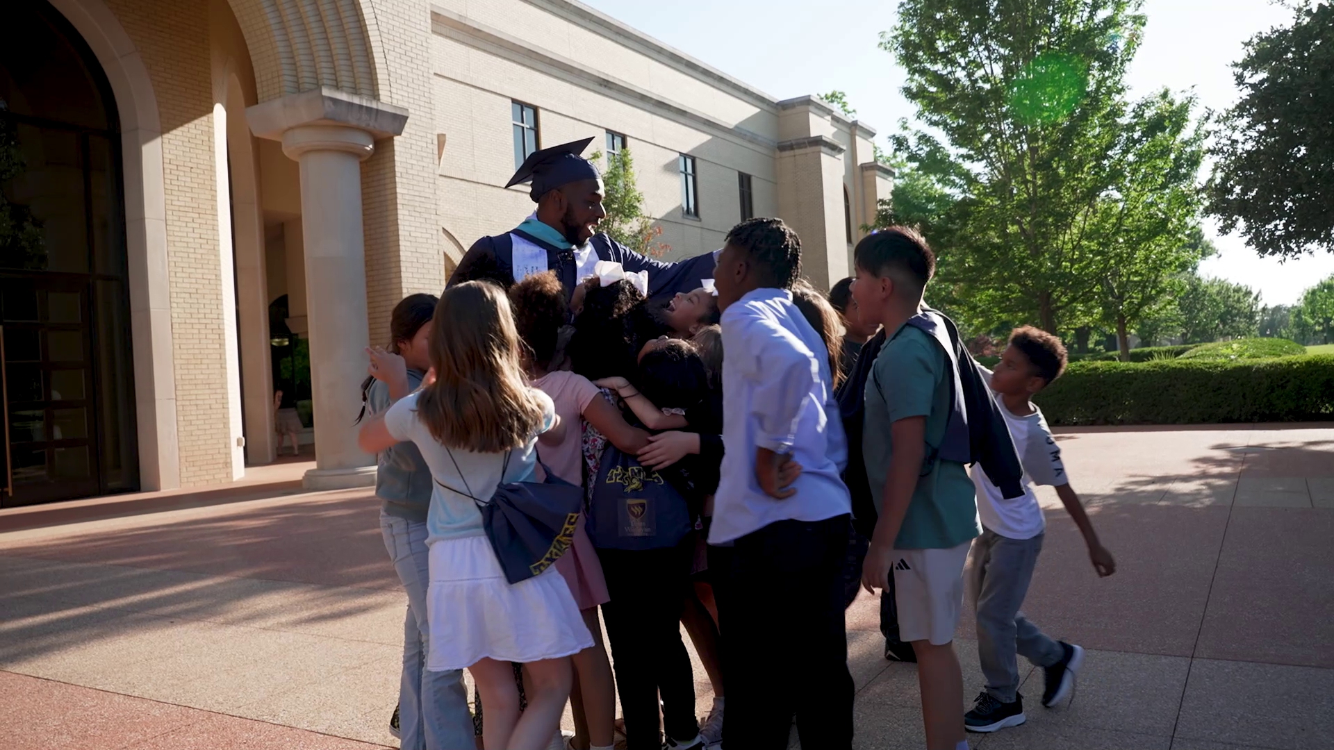 Burleson teacher earns master's degree while students watch