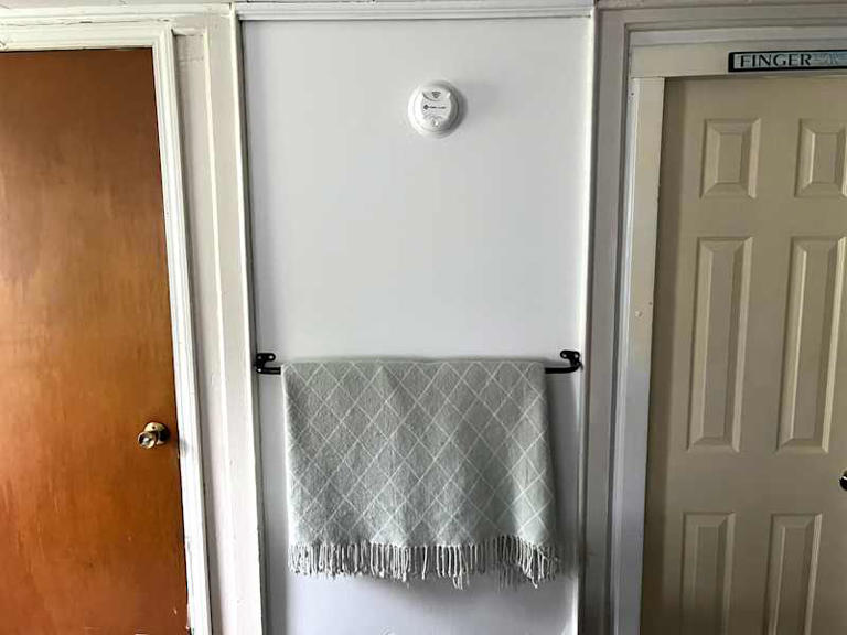 I put a curtain rod on my living room wall - and now I want one in ...