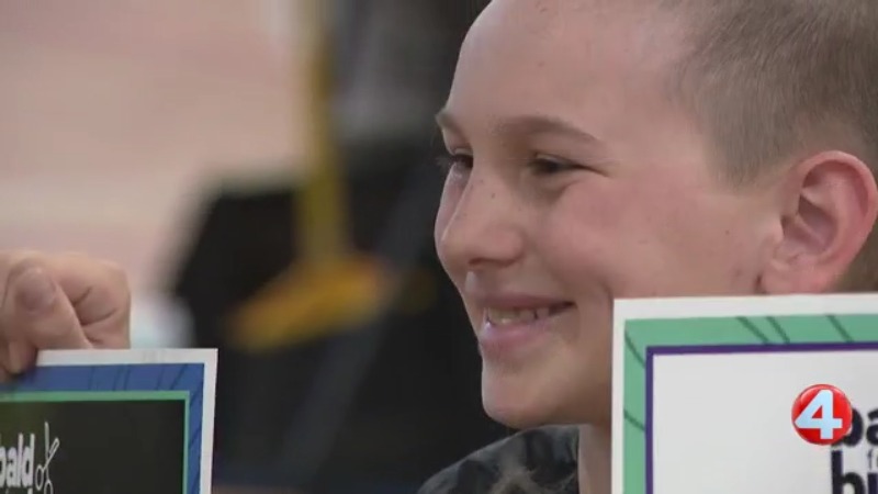 Students, teachers go bald for bucks