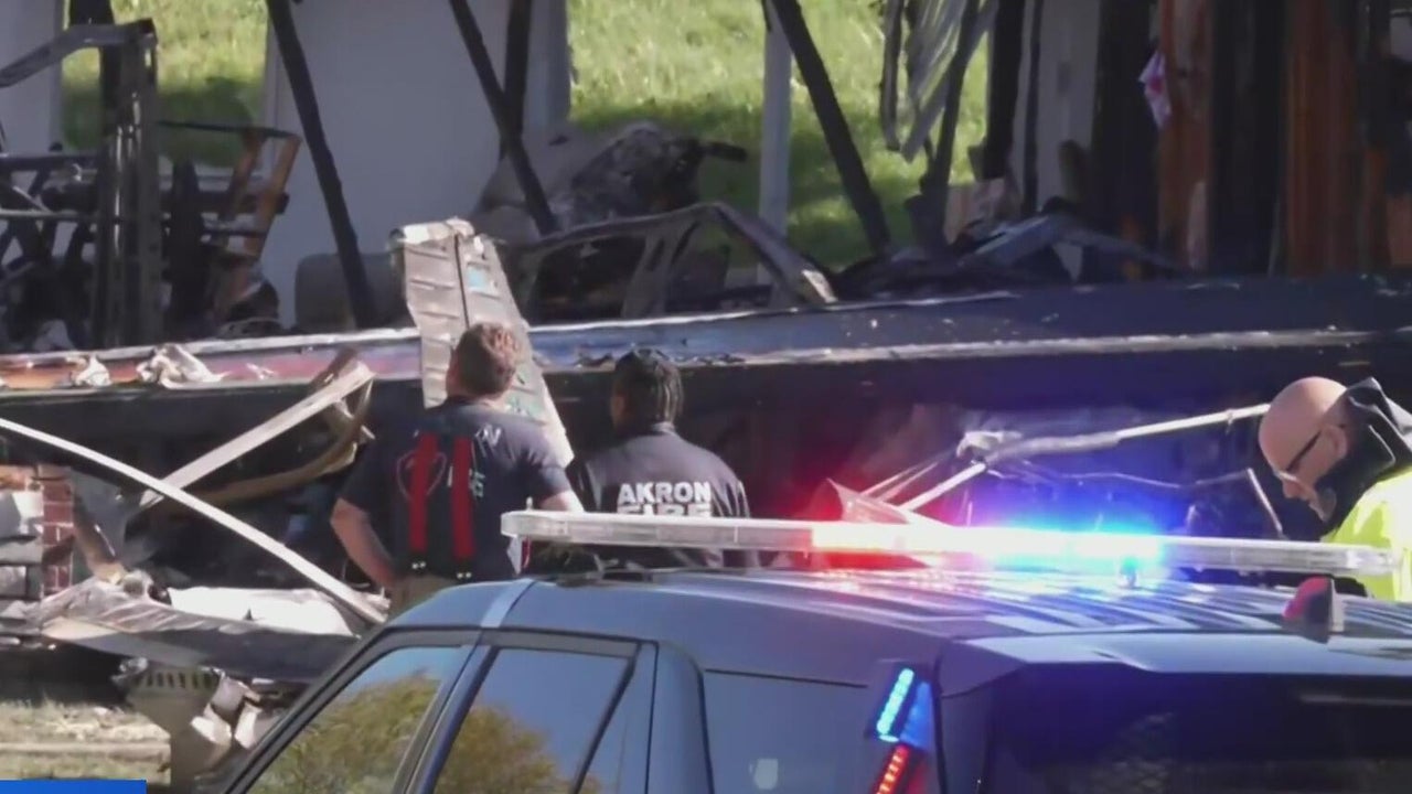Two killed after small plane crashes into Ohio home; family escapes fire