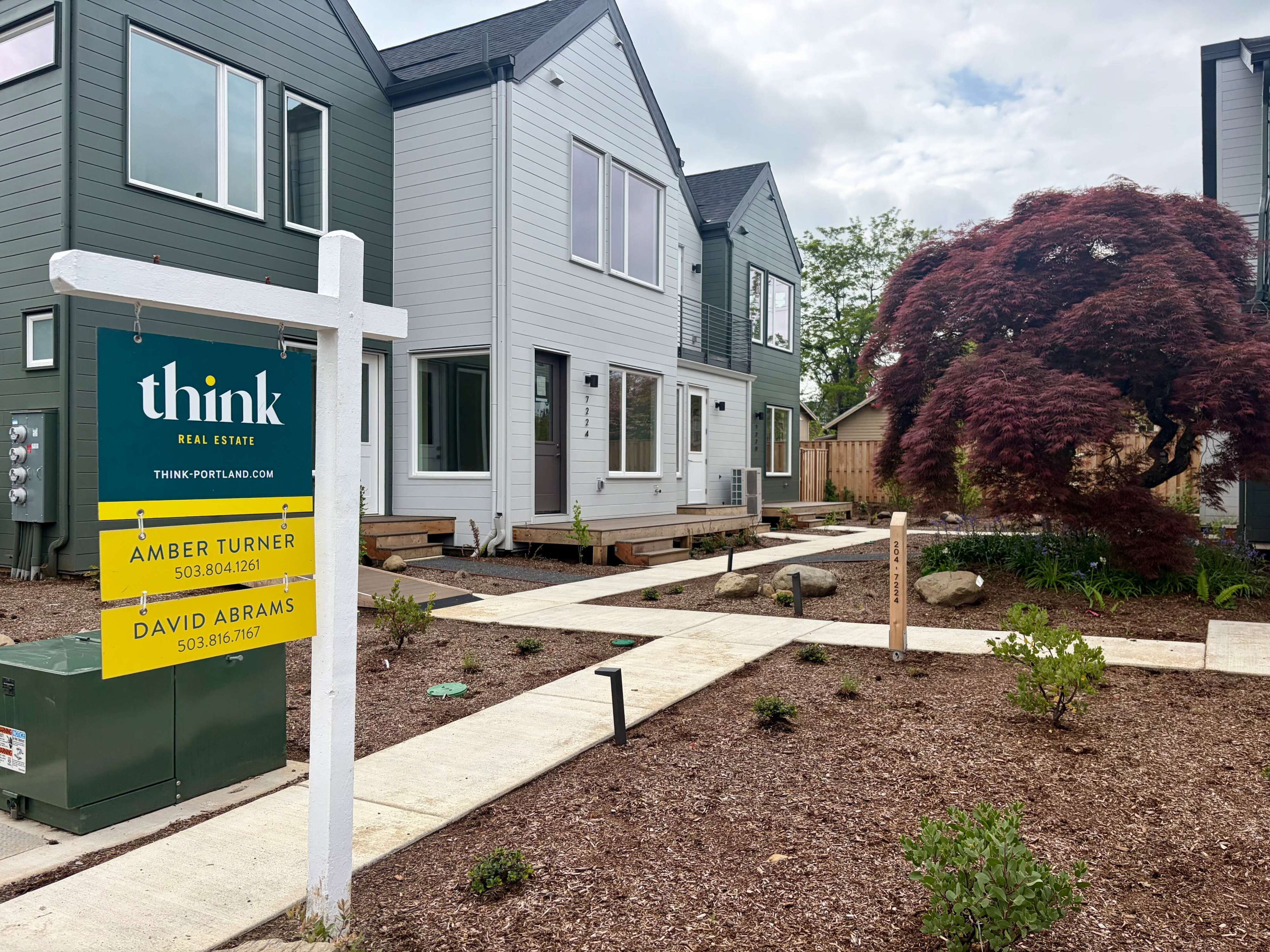 A crowd watched cranes stack these prefab Portland townhomes. Now, they ...