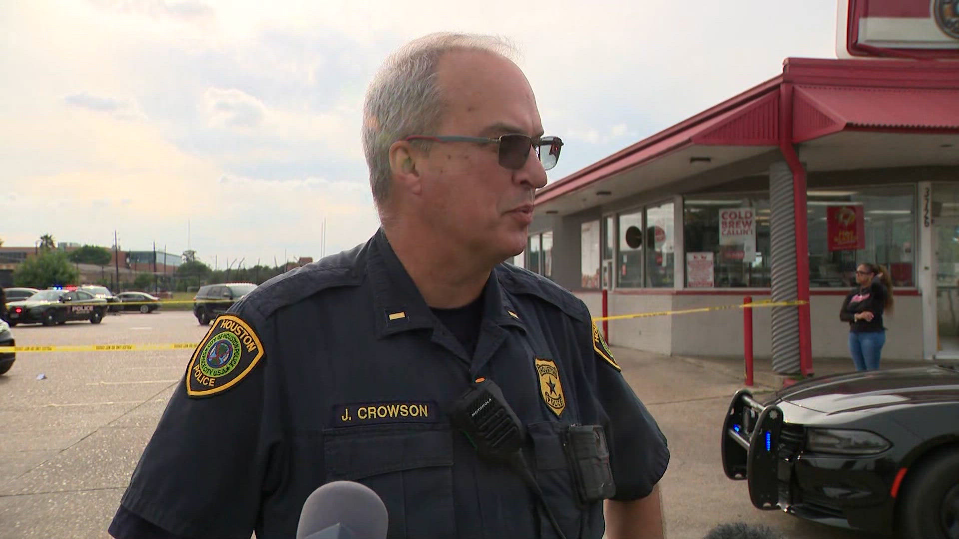 Two teens shot near Yates High School, one person in custody