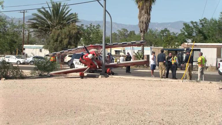 Small plane hits light pole while making emergency landing on Tucson road