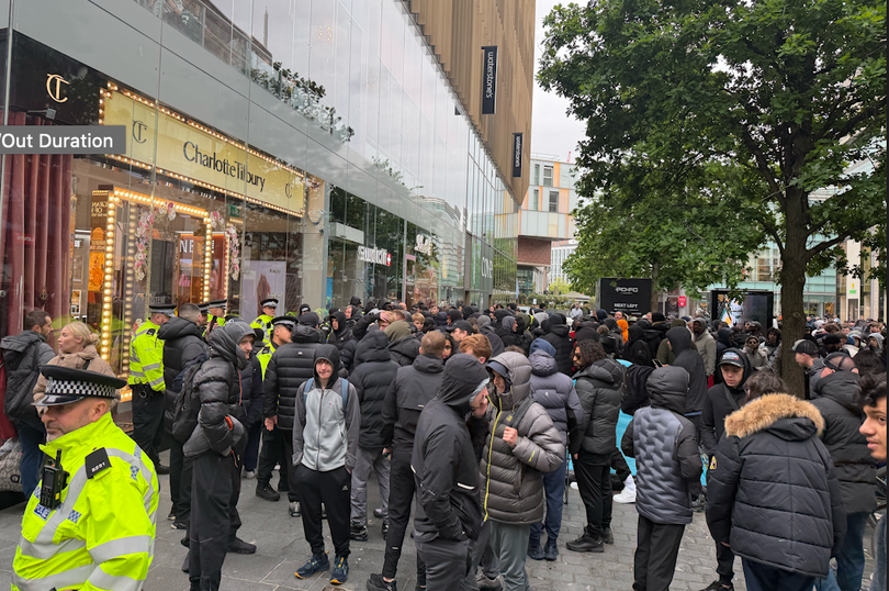 Police surround huge Liverpool ONE queue as shop forced to close