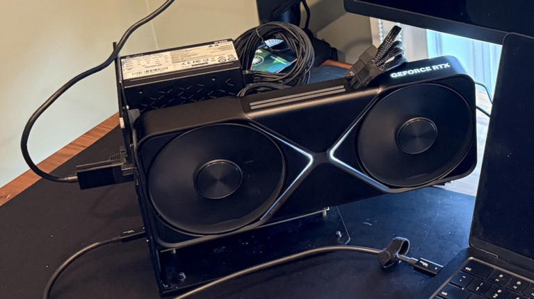 M5 Max MacBook Pro paired with RTX 5090 in an eGPU dock