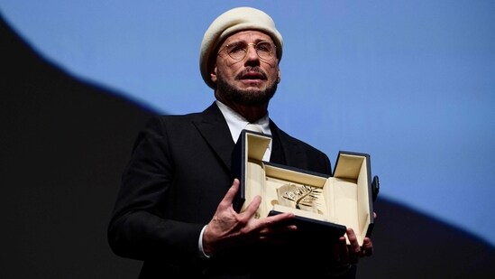 John Travolta breaks down in tears after getting surprise honorary ...
