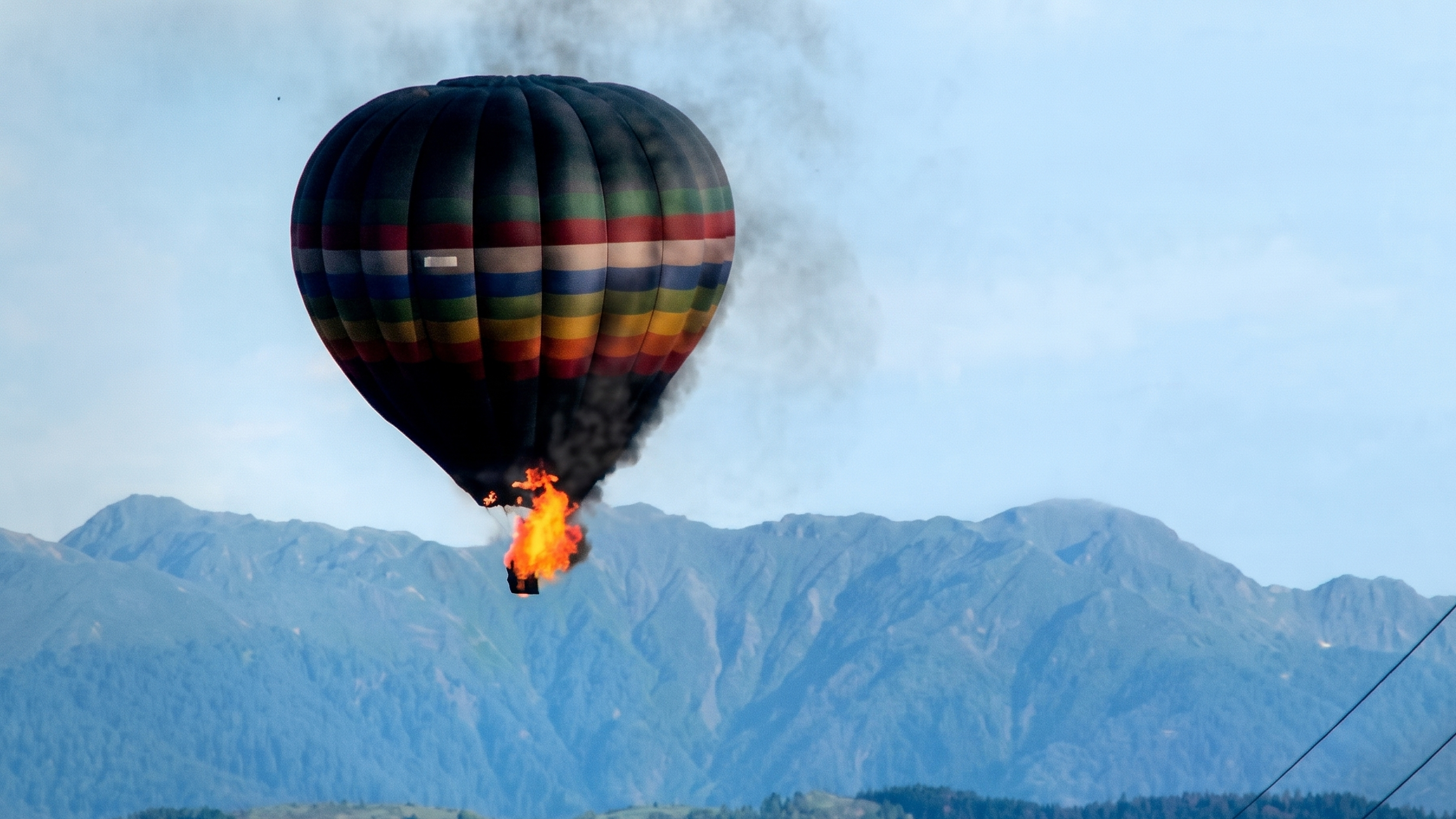 The balloon touched the power lines… then everyone started burning alive