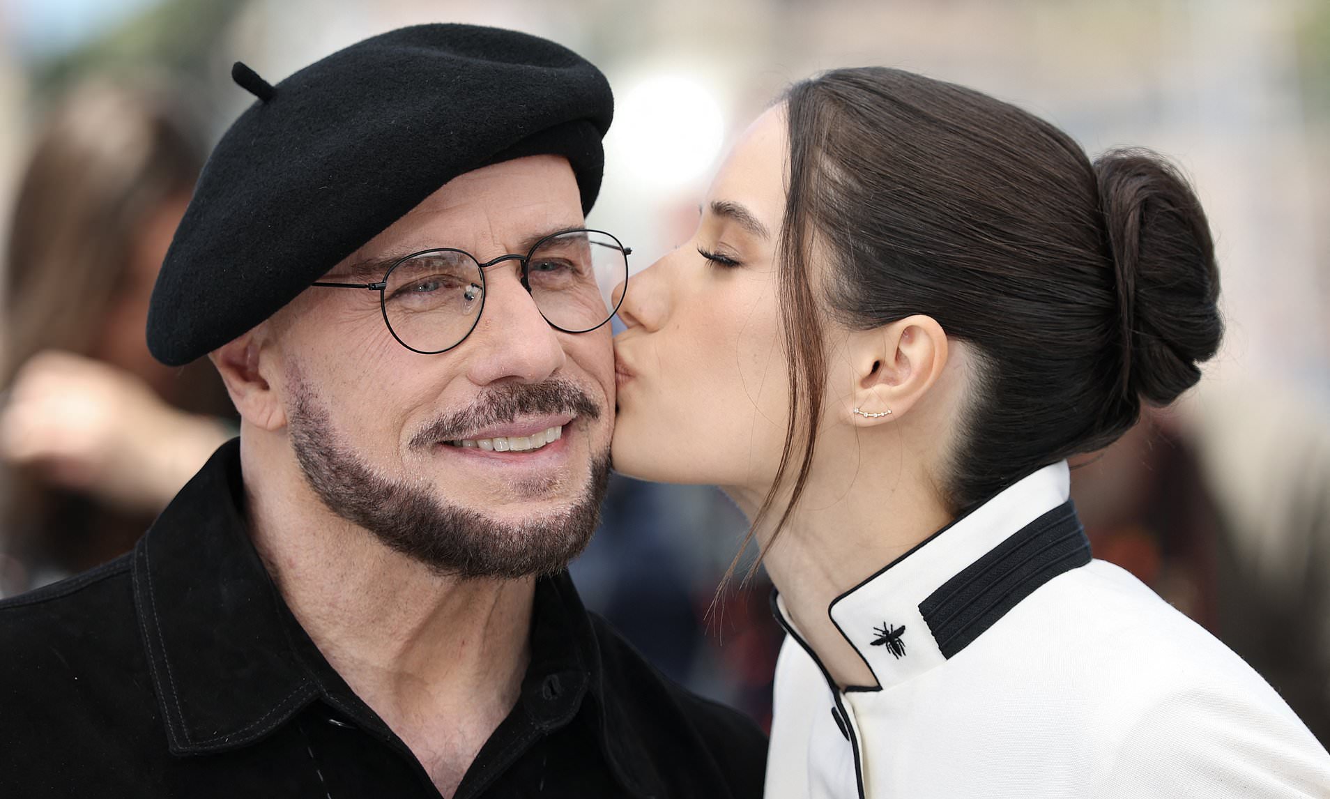 John Travolta rocks another bizarre beret at Cannes - hours after being ...