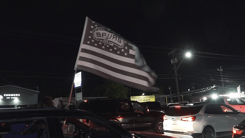 Fans flood downtown after final buzzer, waving Spurs' flags and ...