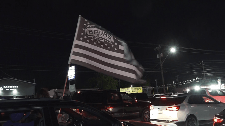Fans flood downtown after final buzzer, waving Spurs' flags and ...