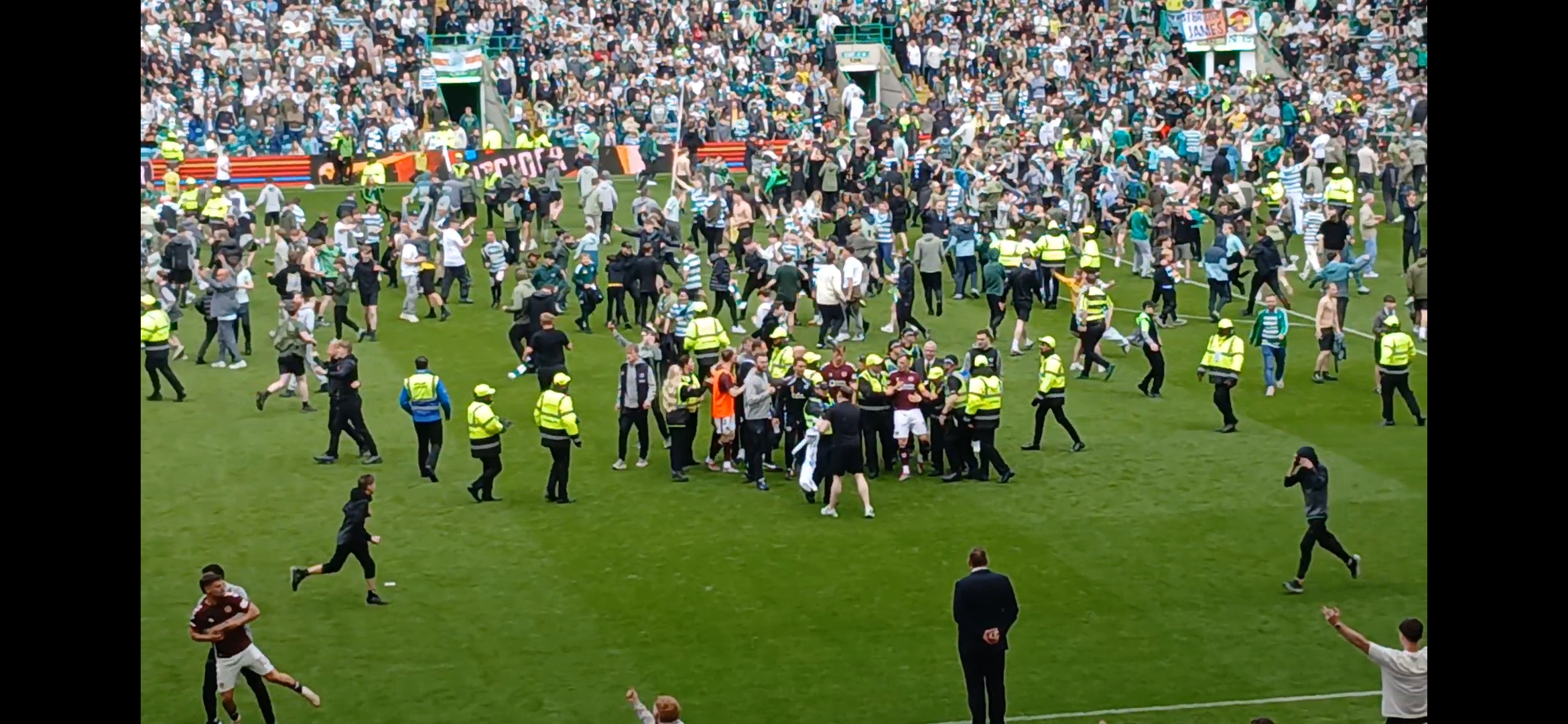 Watch video of Celtic Park chaos as Hearts get a police escort out of ...