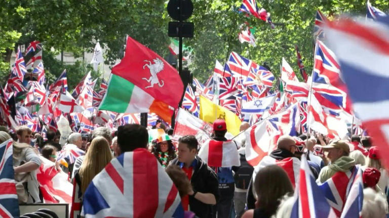 Tens of thousands turn out for UK far-right rally, counter demo