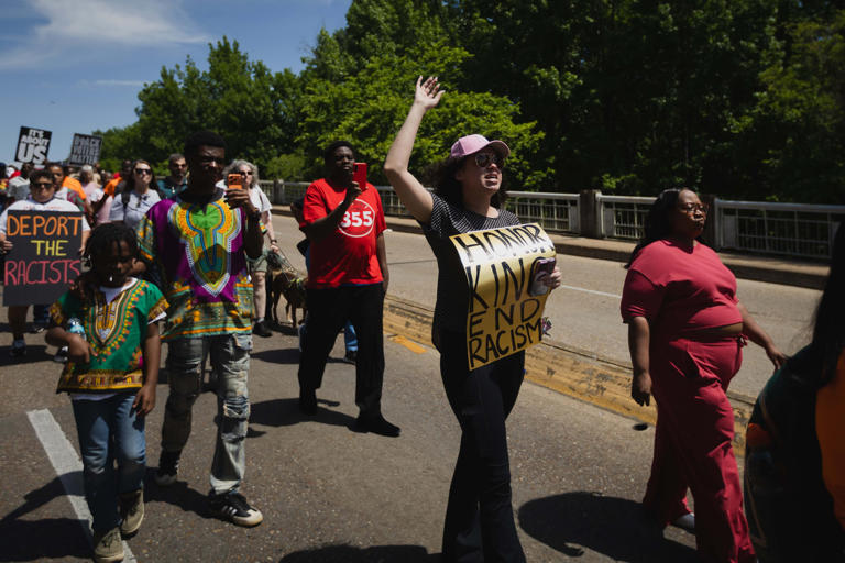 Voting rights activists take symbolic walk across famous bridge as ...