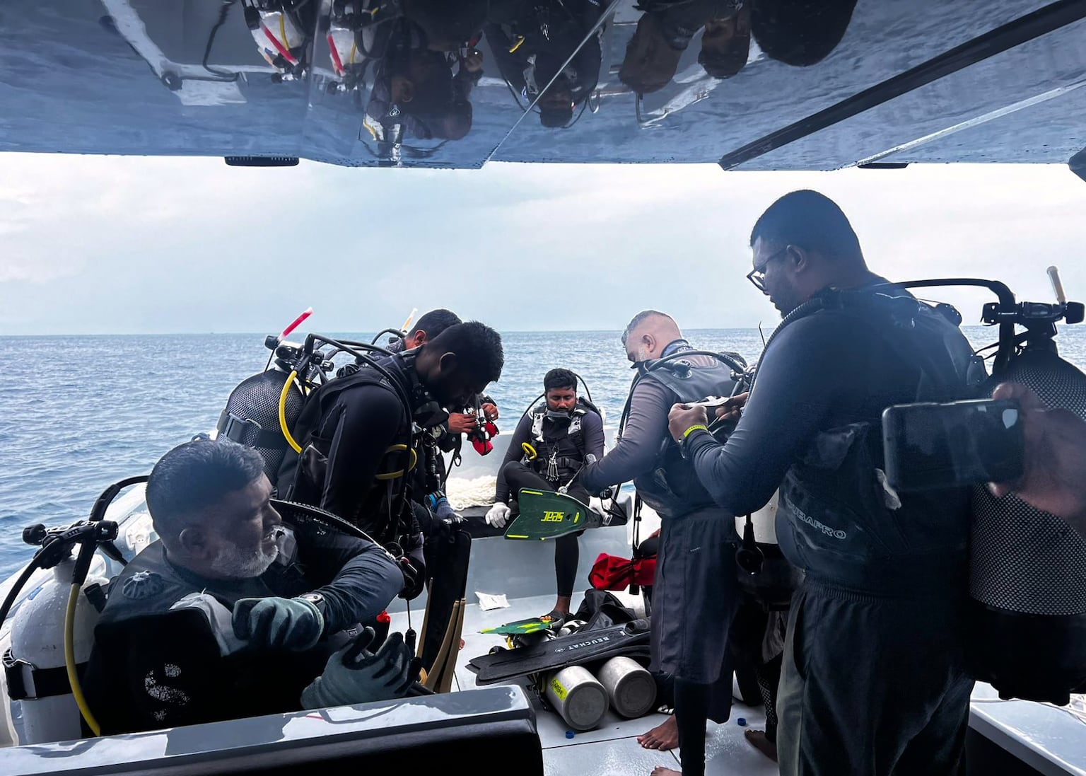 Military diver dies amid search for bodies of four Italians in ...