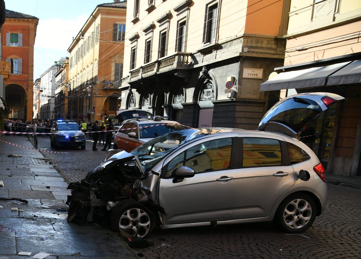 Car rams into a crowd before 'man stabs people' outside department ...