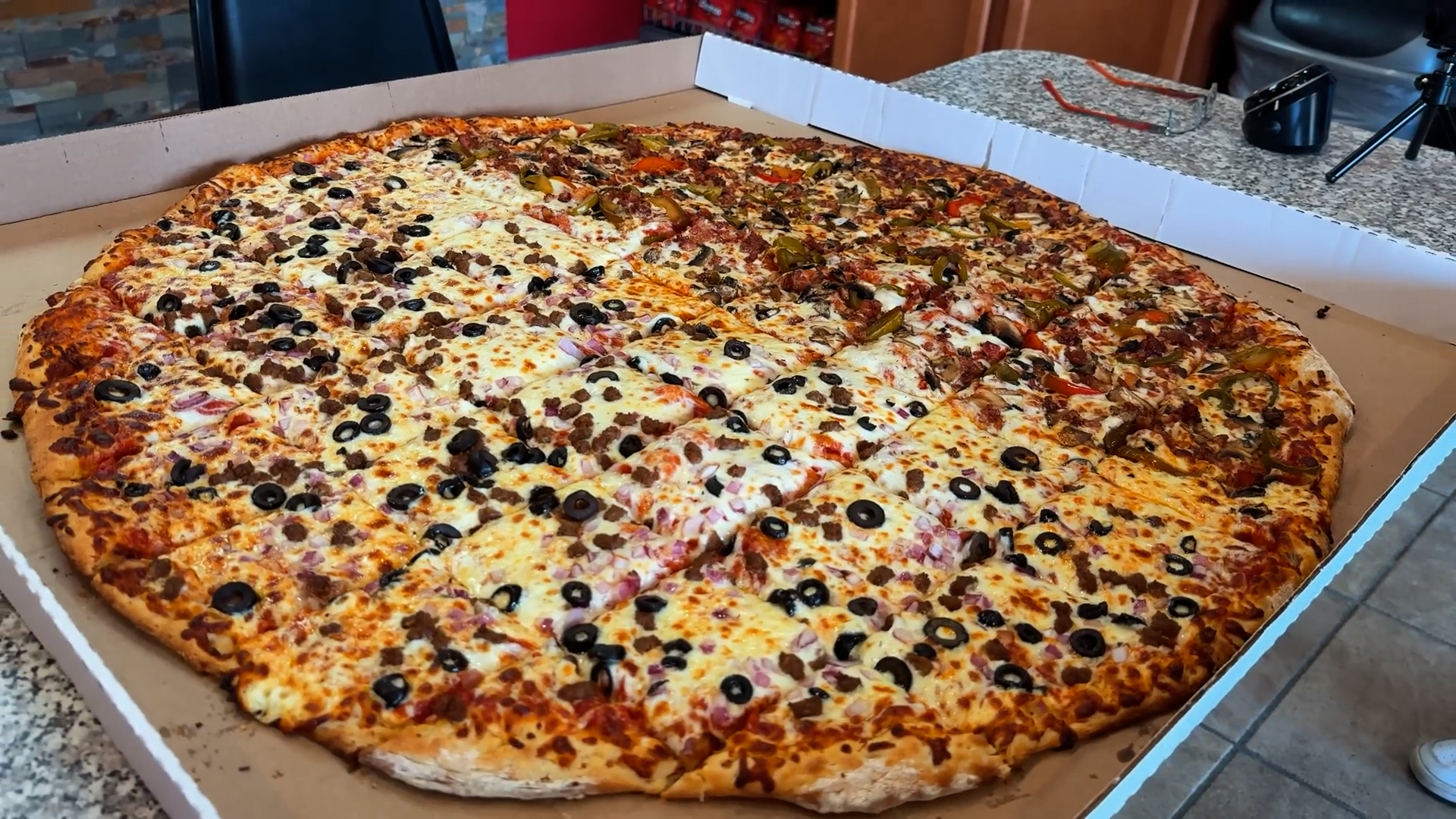Girl tries to beat giant 52-slice pizza challenge in one hour
