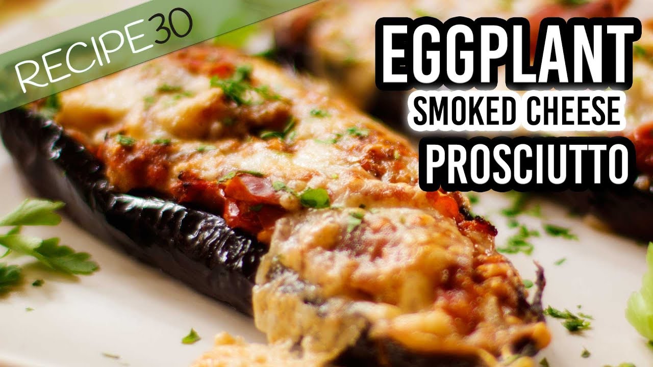 Baked eggplants, smoked cheese and prosciutto Italian style