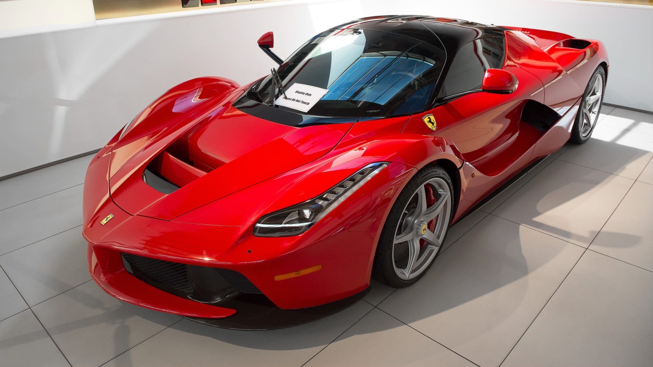 Ferrari’s first electric car debuts this month — four motors, over ...