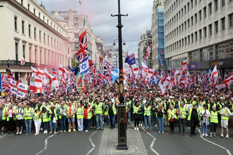 Tens of thousands turn out for UK far-right rally, counter demo