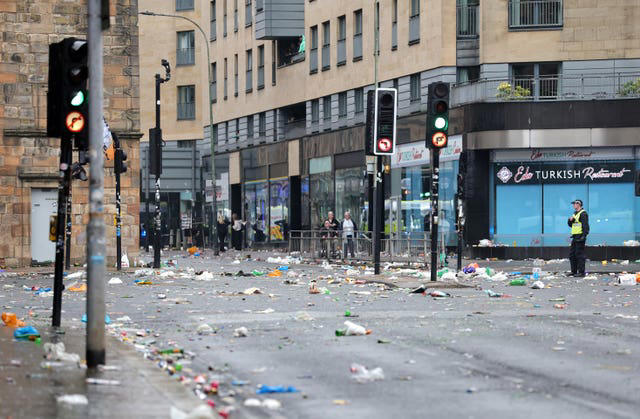 Police officers injured during serious disorder after Celtic’s title win