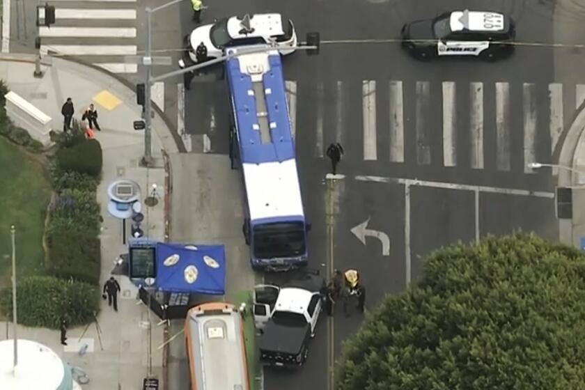 Woman killed in Santa Monica after crawling under Metro bus