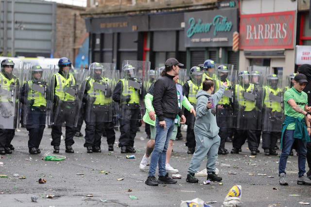 Police officers injured during serious disorder after Celtic’s title win